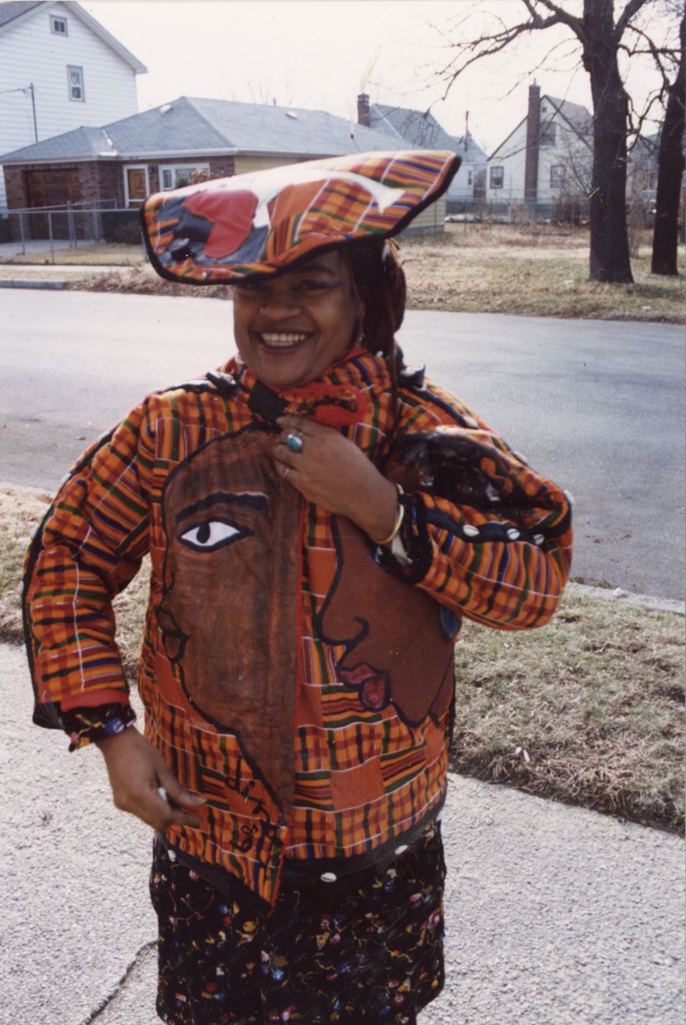 Photograph of Dindga McCannon in painted coat and hat - TFI