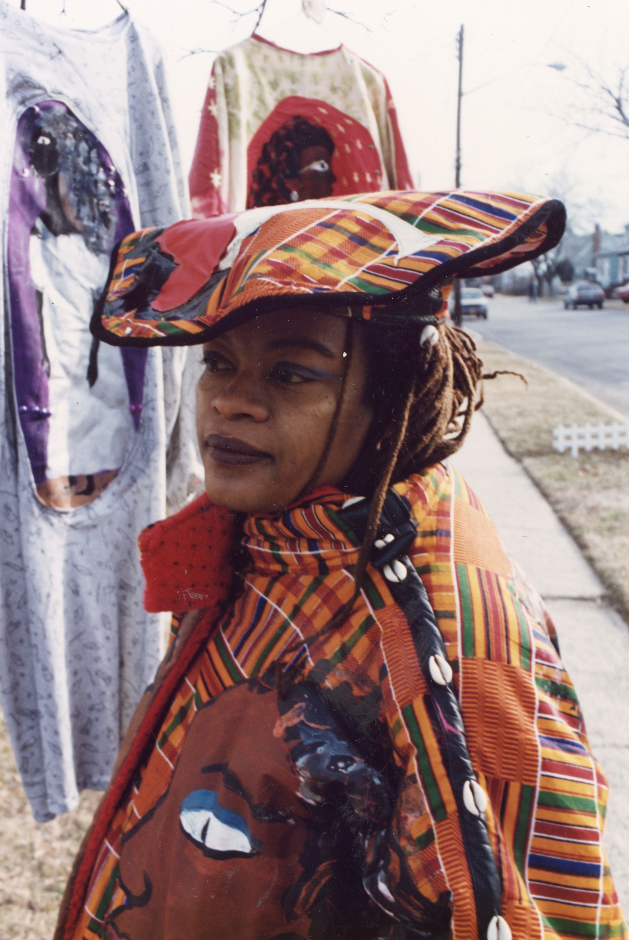 Photograph of Dindga McCannon in painted coat and hat - TFI