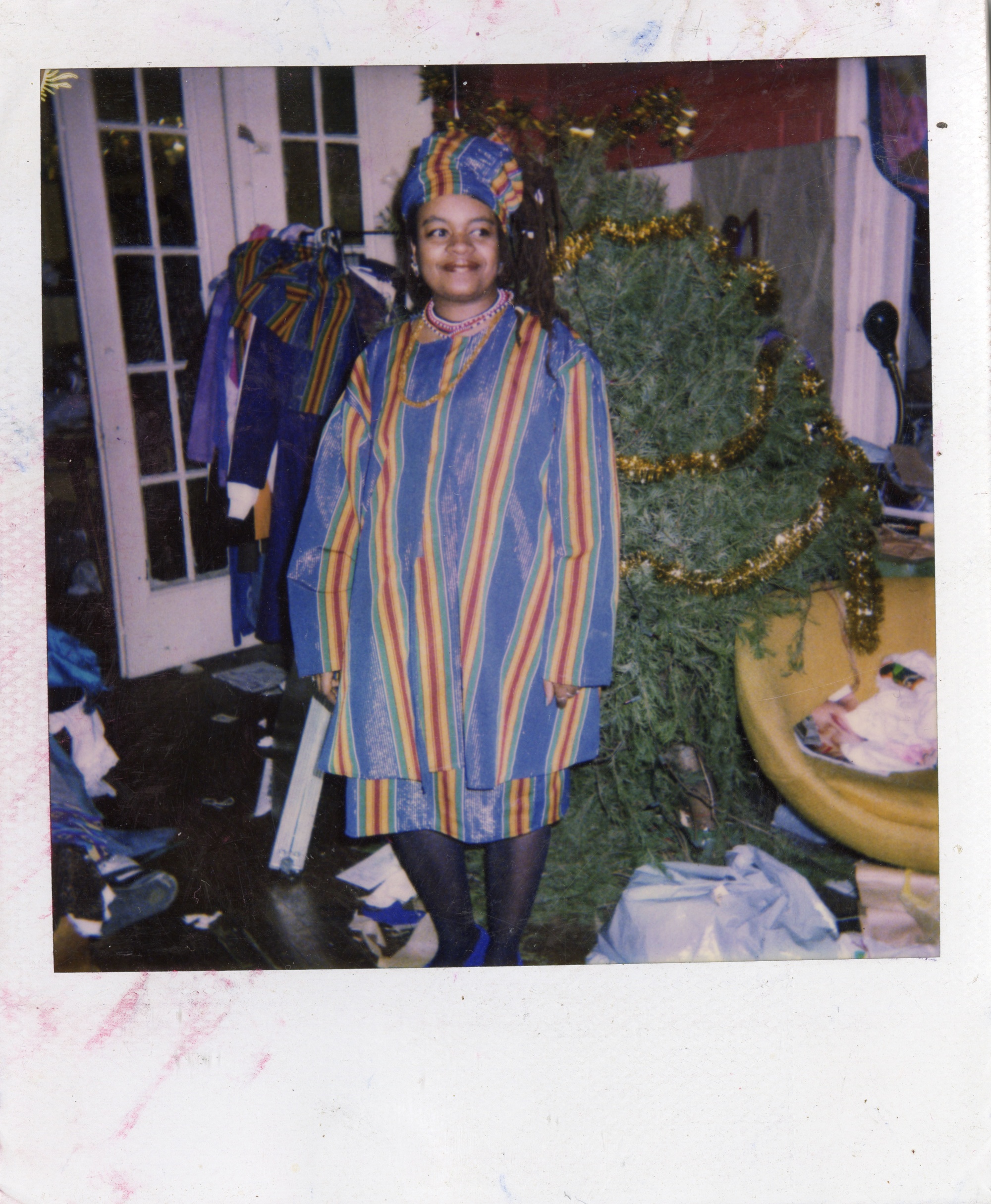 Photo of Dindga McCannon in sewn vest and hat - TFI